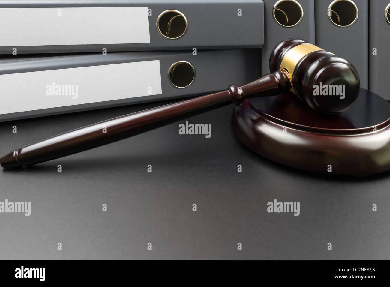 close-up of judges gavel and file folders with copy space on labels on ...