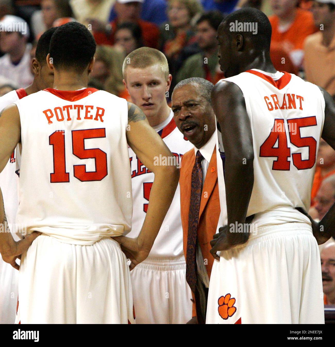 Clemson's coach Oliver Purnell talks to his player as they fall behind ...