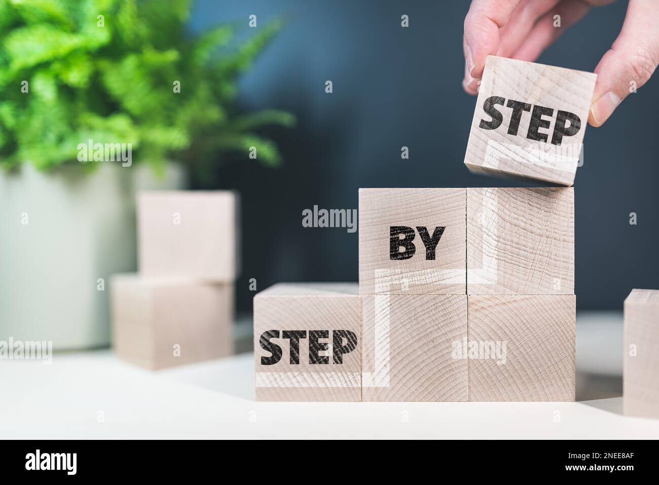 words step by step on wooden blocks, growth and progress concept Stock ...