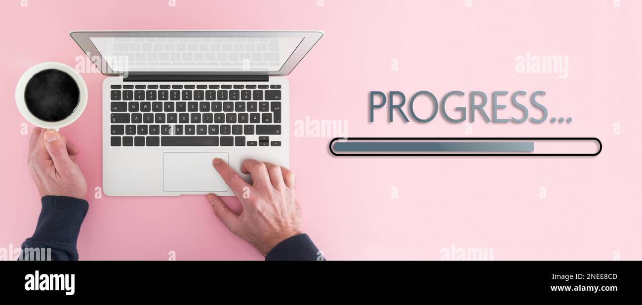 work progress concept, above view of person working on laptop computer ...