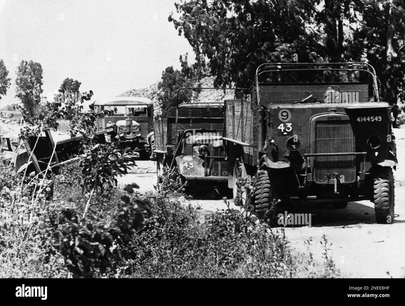 Lorries left behind by the British when they retreated along the ...