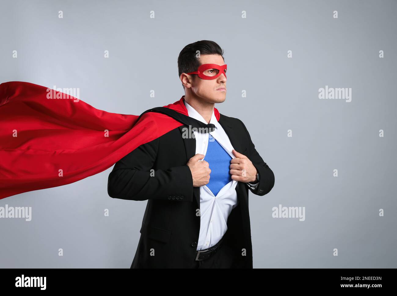 Superhero pose suit hi-res stock photography and images - Alamy
