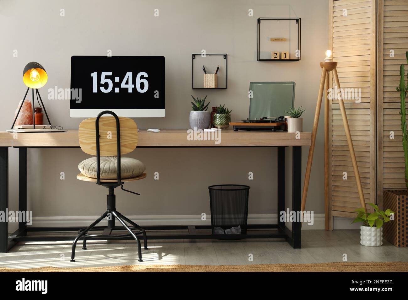 Room interior with comfortable workplace. Modern computer on wooden ...