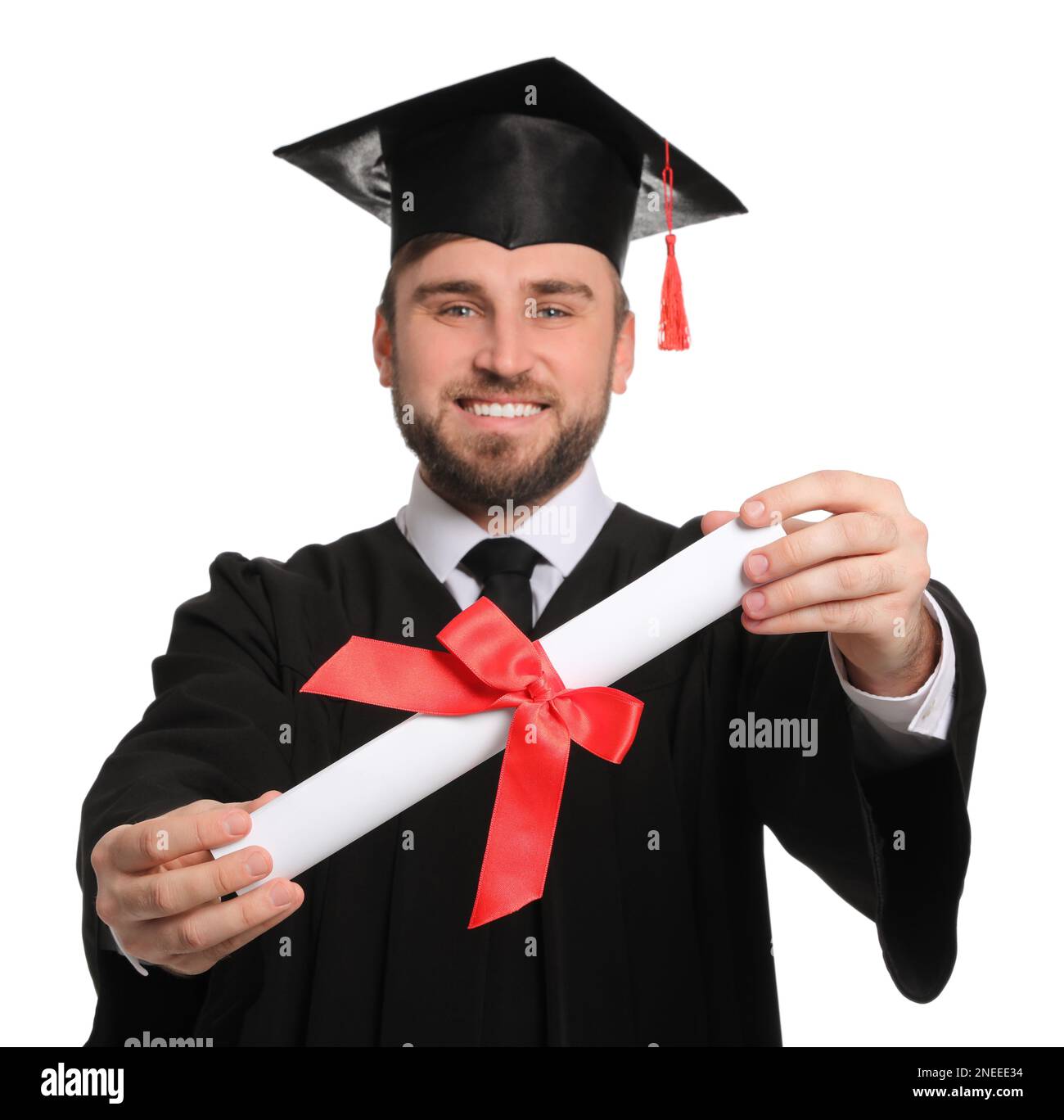 Happy student with graduation hat against white background, focus on ...