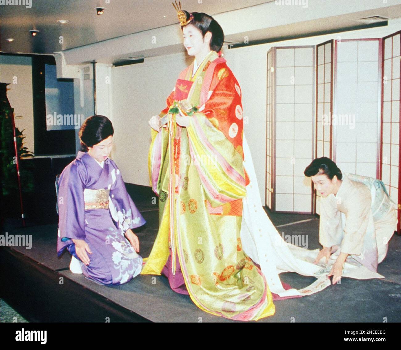 Mrs. Tomioka, left, and Mrs. Fujimoto, professorsof Kitsuke(the art of ...