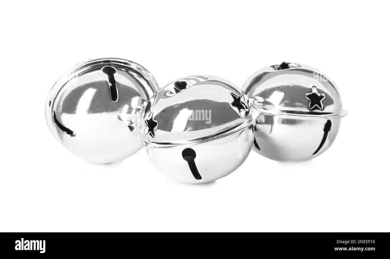 Shiny silver sleigh bells on white background Stock Photo - Alamy