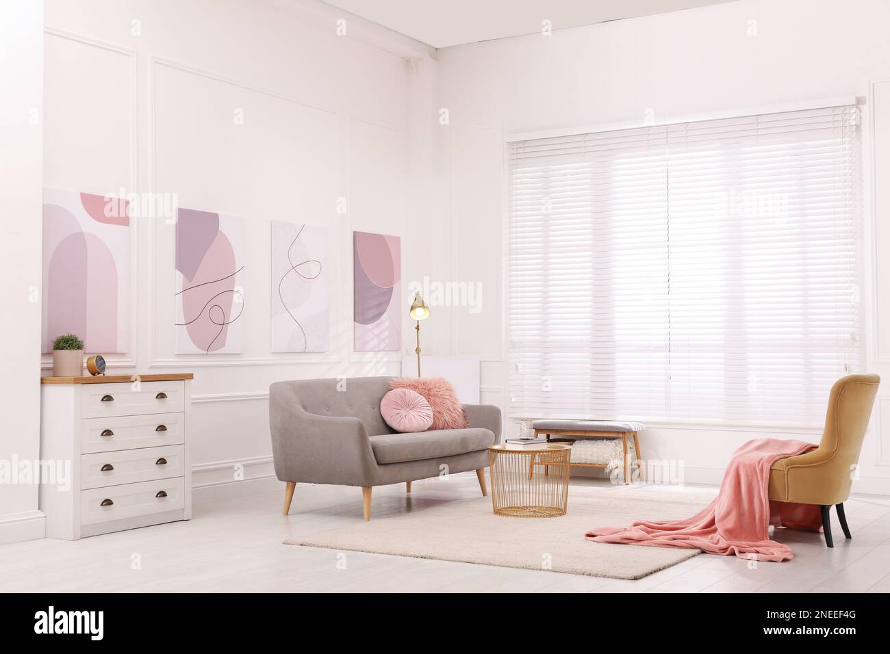 Stylish living room interior with comfortable sofa and beautiful ...