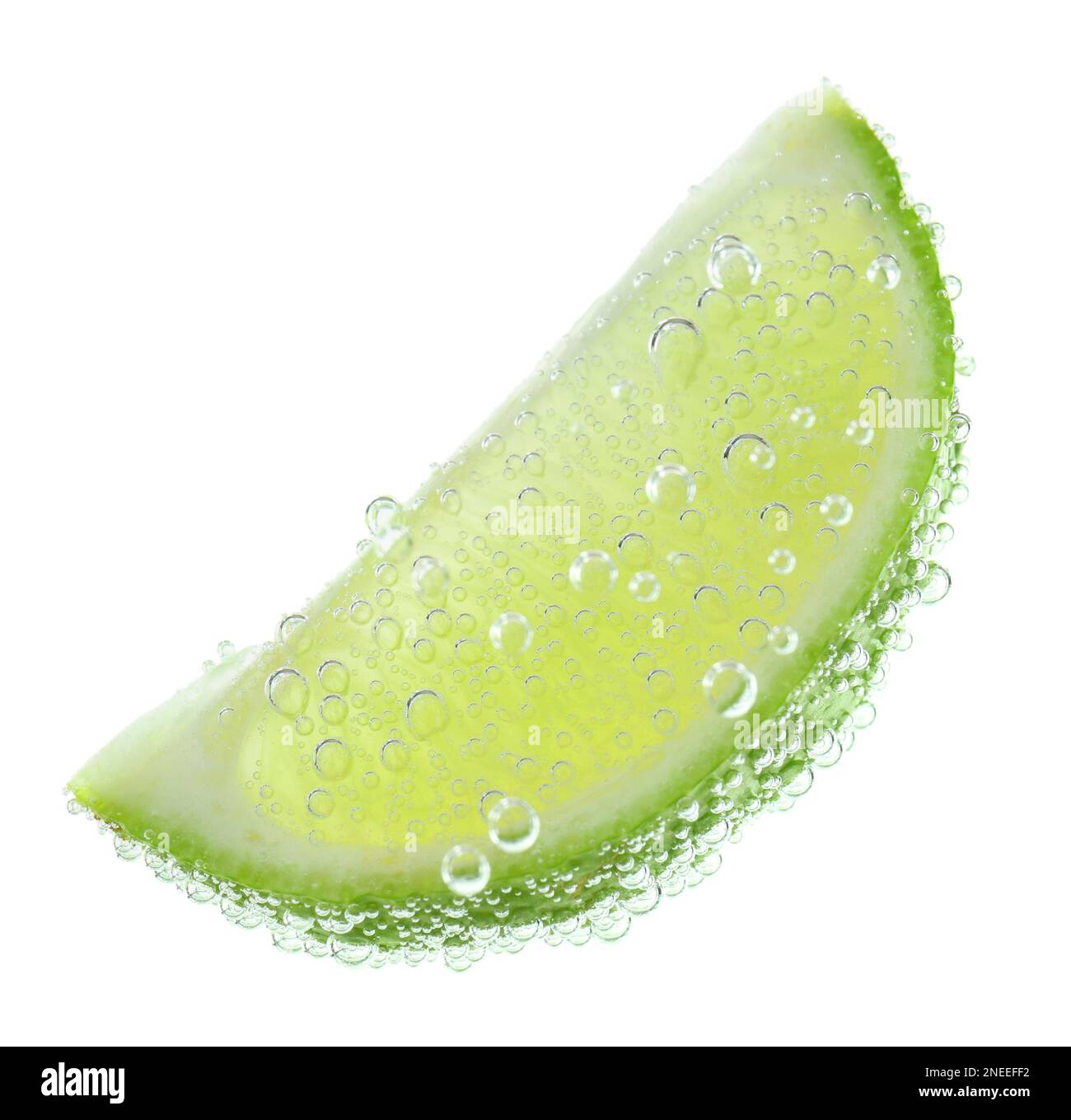 Fresh lime slice in sparkling water on white background Stock Photo - Alamy