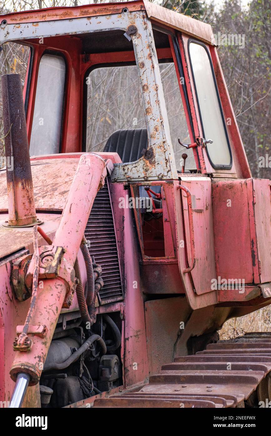A red old tractor in field Stock Photo - Alamy