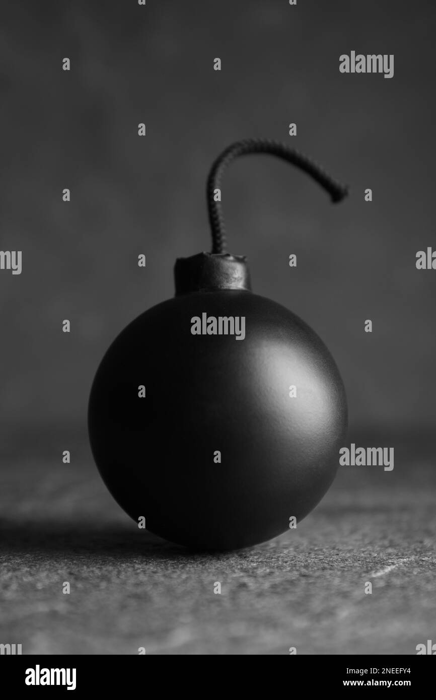 Old fashioned fuse bomb on grey table Stock Photo - Alamy