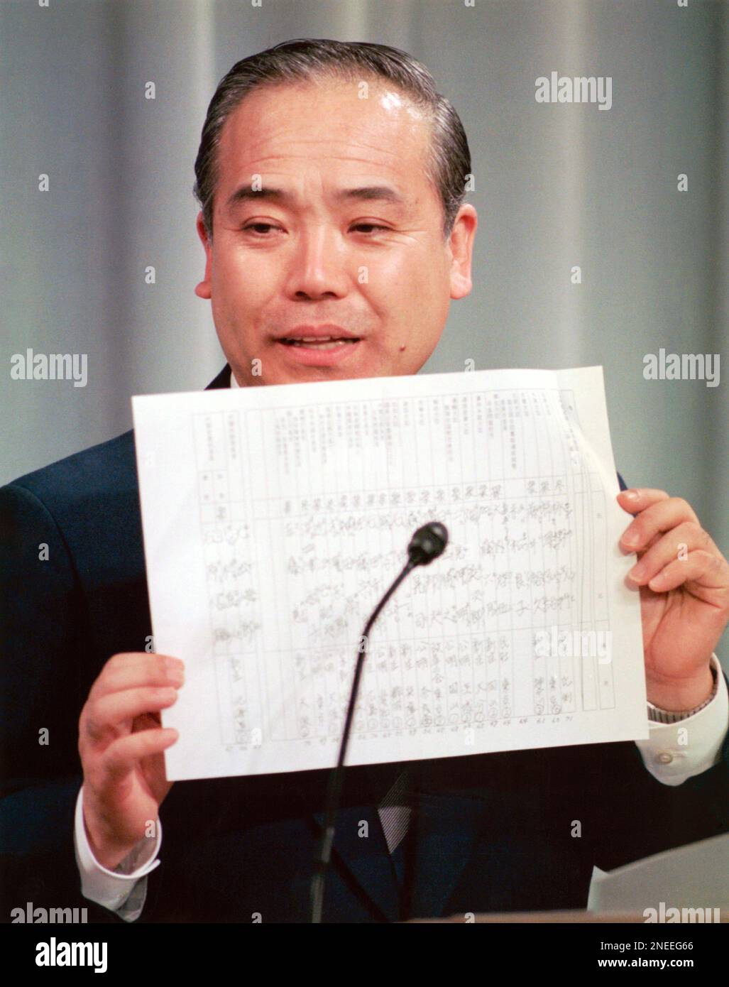 Chief Cabinet Secretary hiroshi Kumagai shows a list of new cabinet ...