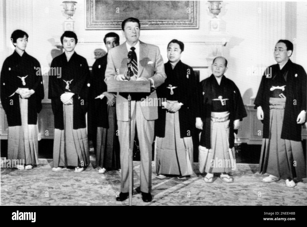 President Ronald Reagan says a few words as members of the Shochiku ...