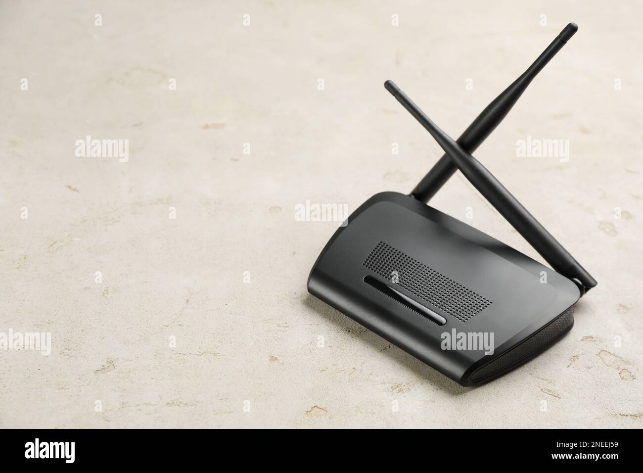 Modern Wi-Fi router on light background. Space for text Stock Photo - Alamy