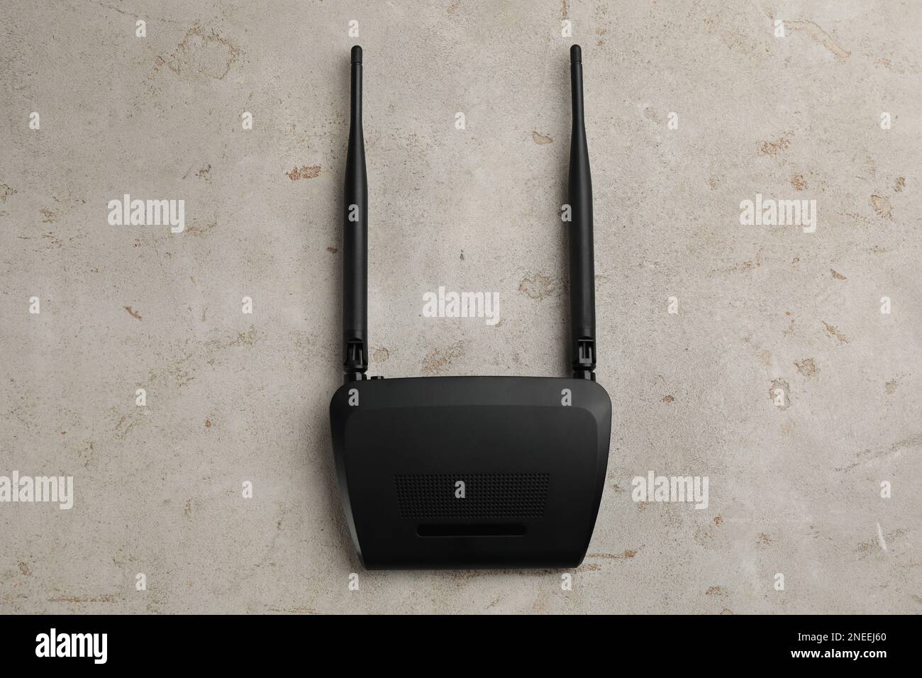 Modern Wi-Fi router on light background, top view Stock Photo - Alamy