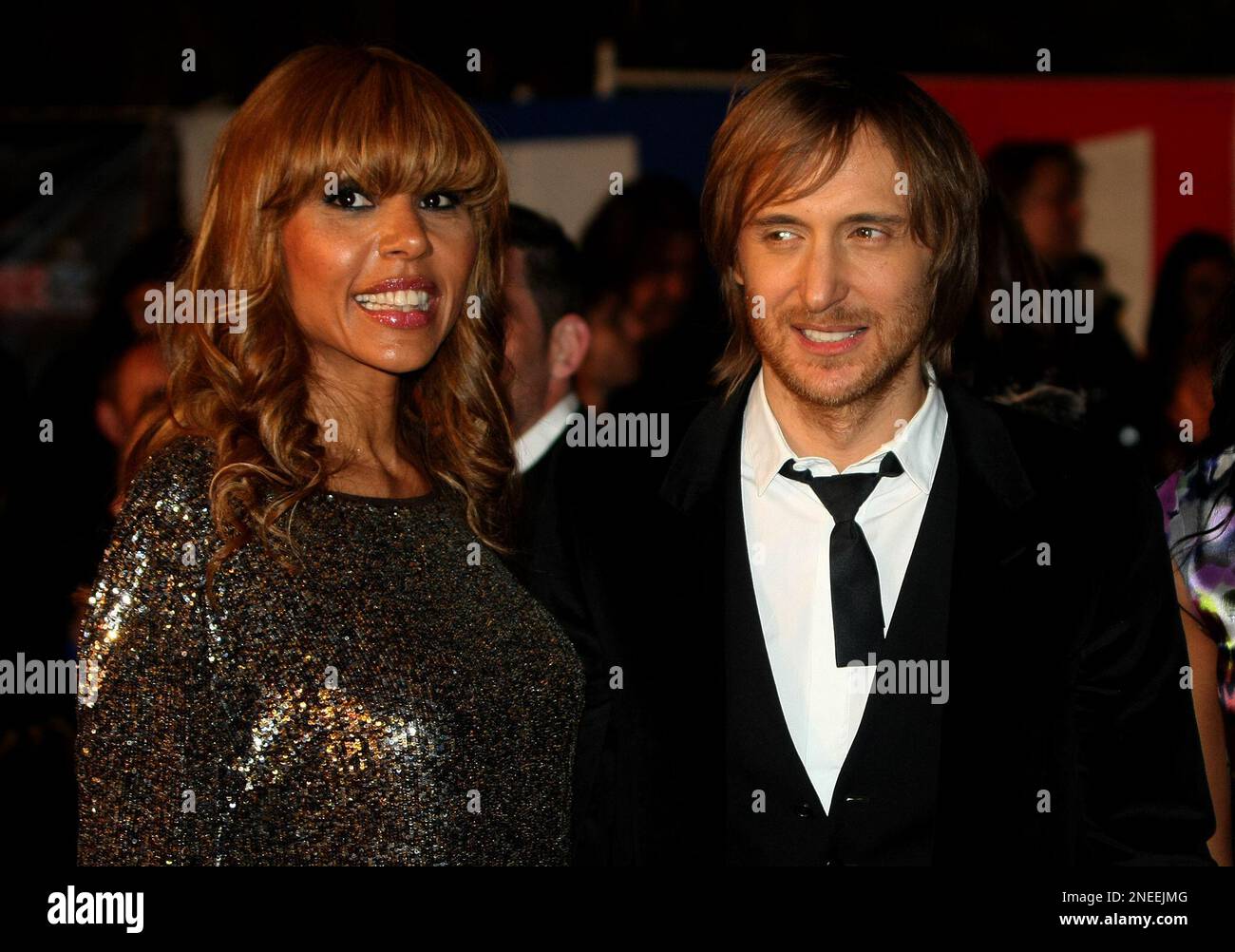 French house producer and DJ David Guetta, with his wife Cathy arrive ...