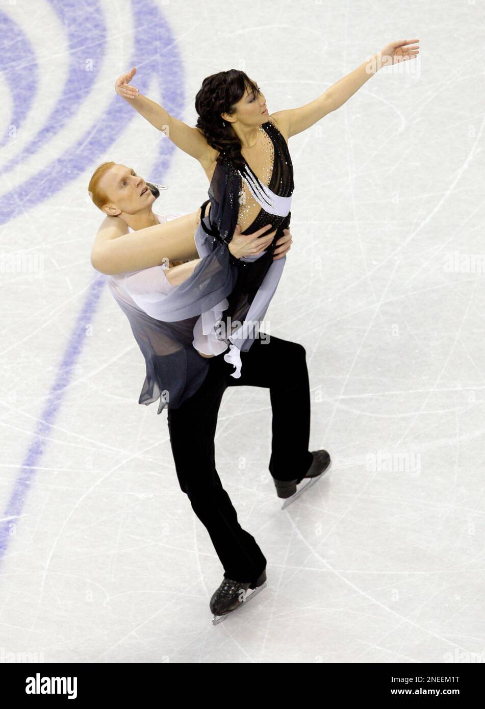 Grace Cho and Dmitry Ponomarev perform their ice dancing free dance ...