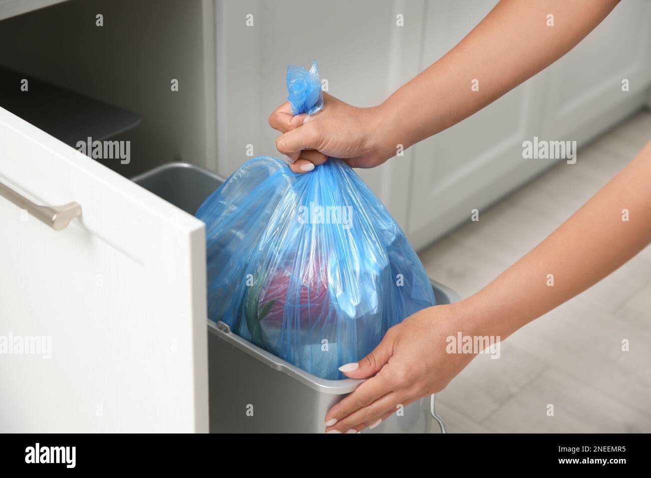 Taking out rubbish female hi-res stock photography and images - Alamy