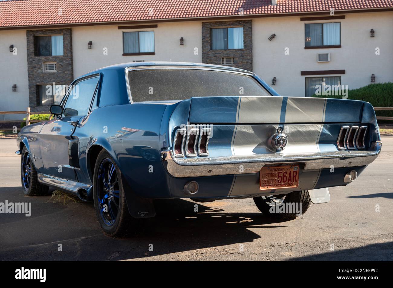 A detail of a first-generation Ford Mustang with blue color and ...