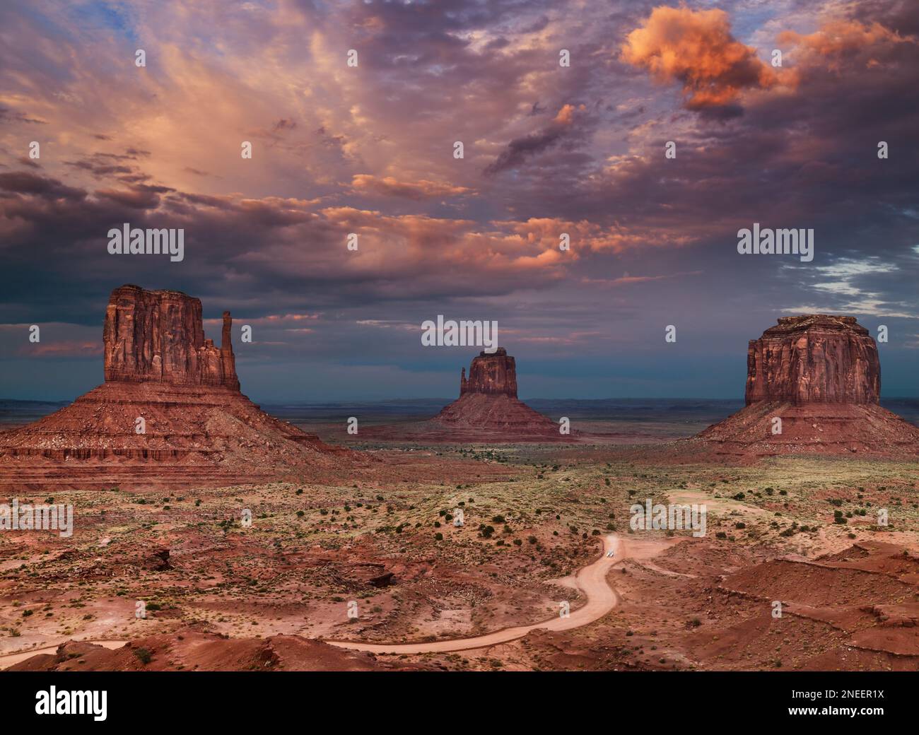 The famous buttes of Monument Valley at sunset, Utah, USA Stock Photo ...