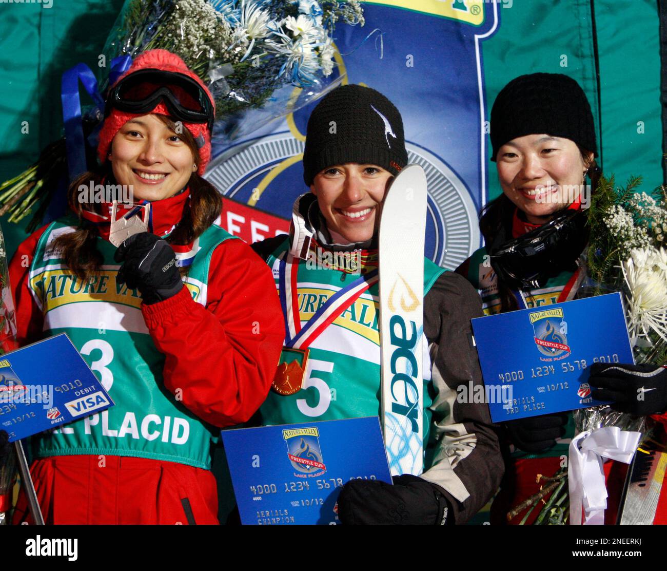Gold medalist Lydia Lassila, of Australia, center, silver medalist Li ...