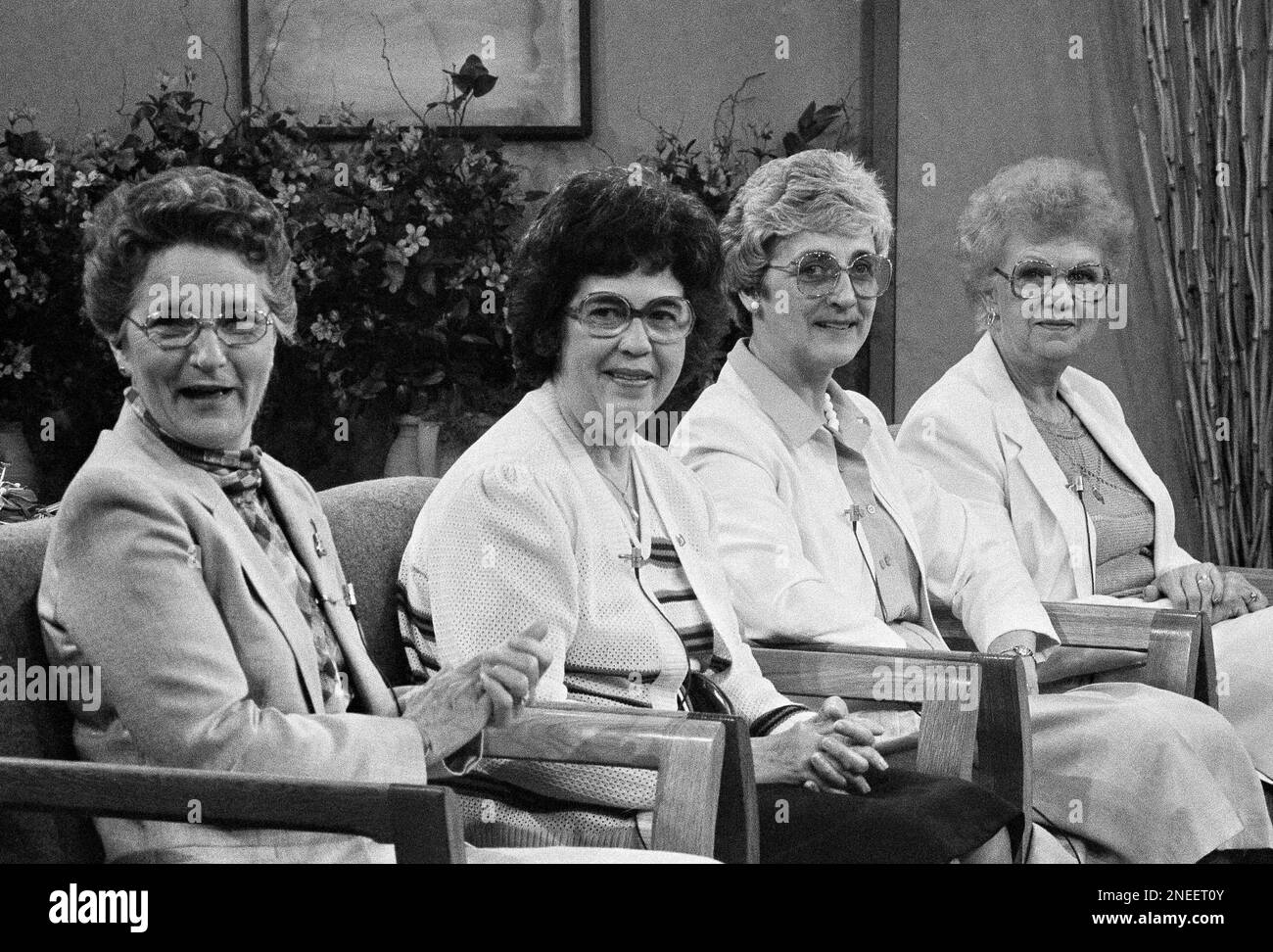 The wives of four artificial heart recipients listen to audience ...