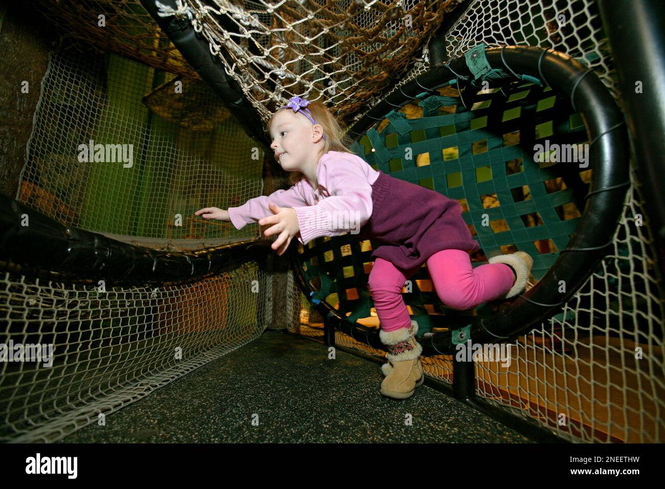 Lillian climbs through the tree tunnels at Doubletree Hotels and Arbor ...