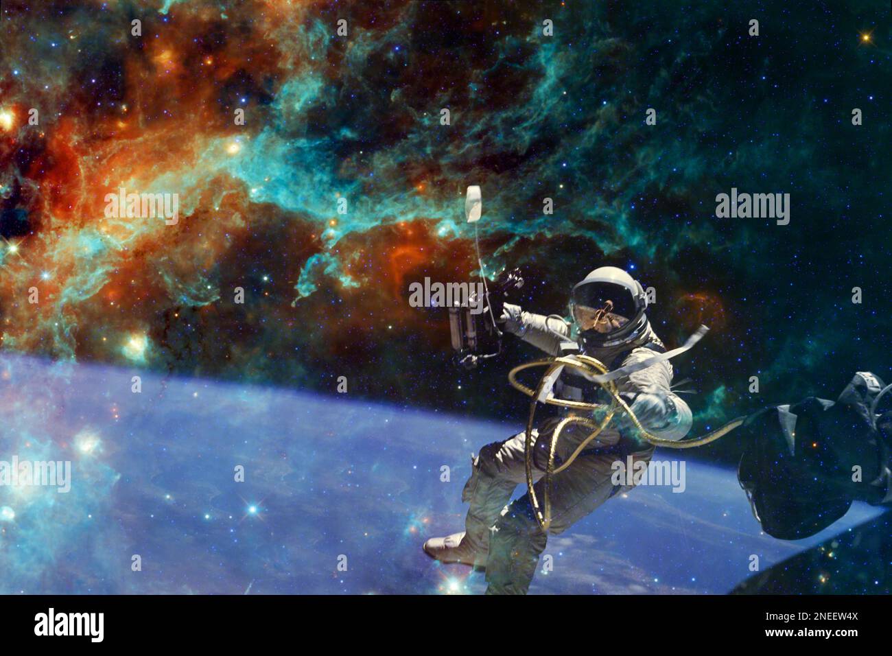 Astronaut. Nebula, cluster of stars in deep space. Science fiction art. Elements of this image ...