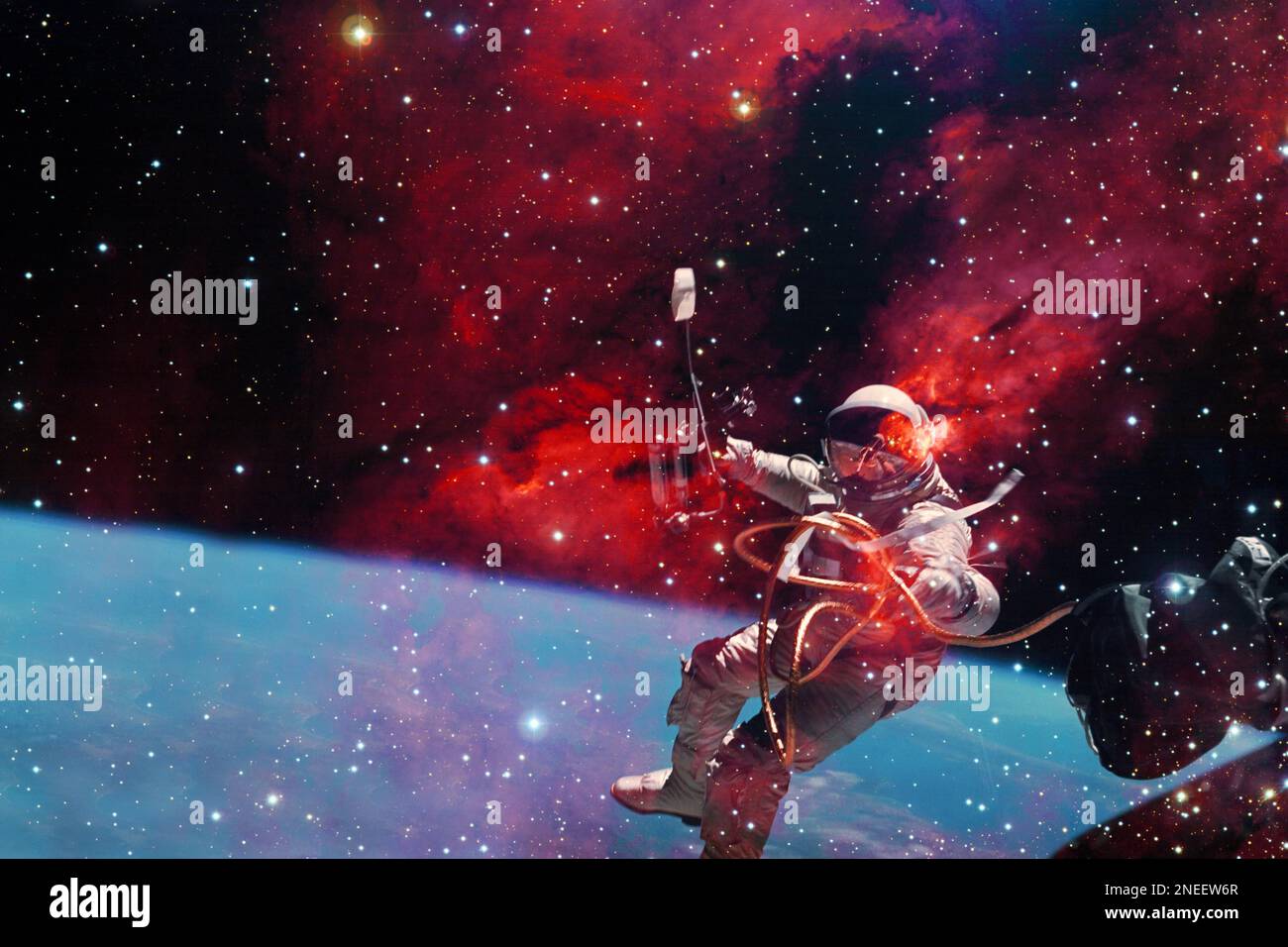 Astronaut. Nebula, cluster of stars in deep space. Science fiction art. Elements of this image ...