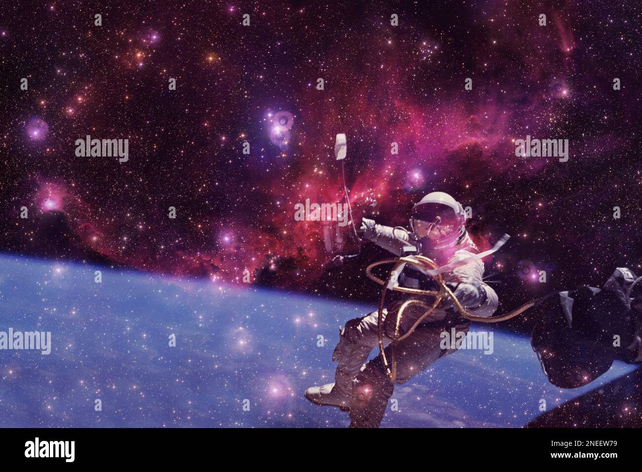 Astronaut. Nebula, cluster of stars in deep space. Science fiction art. Elements of this image ...