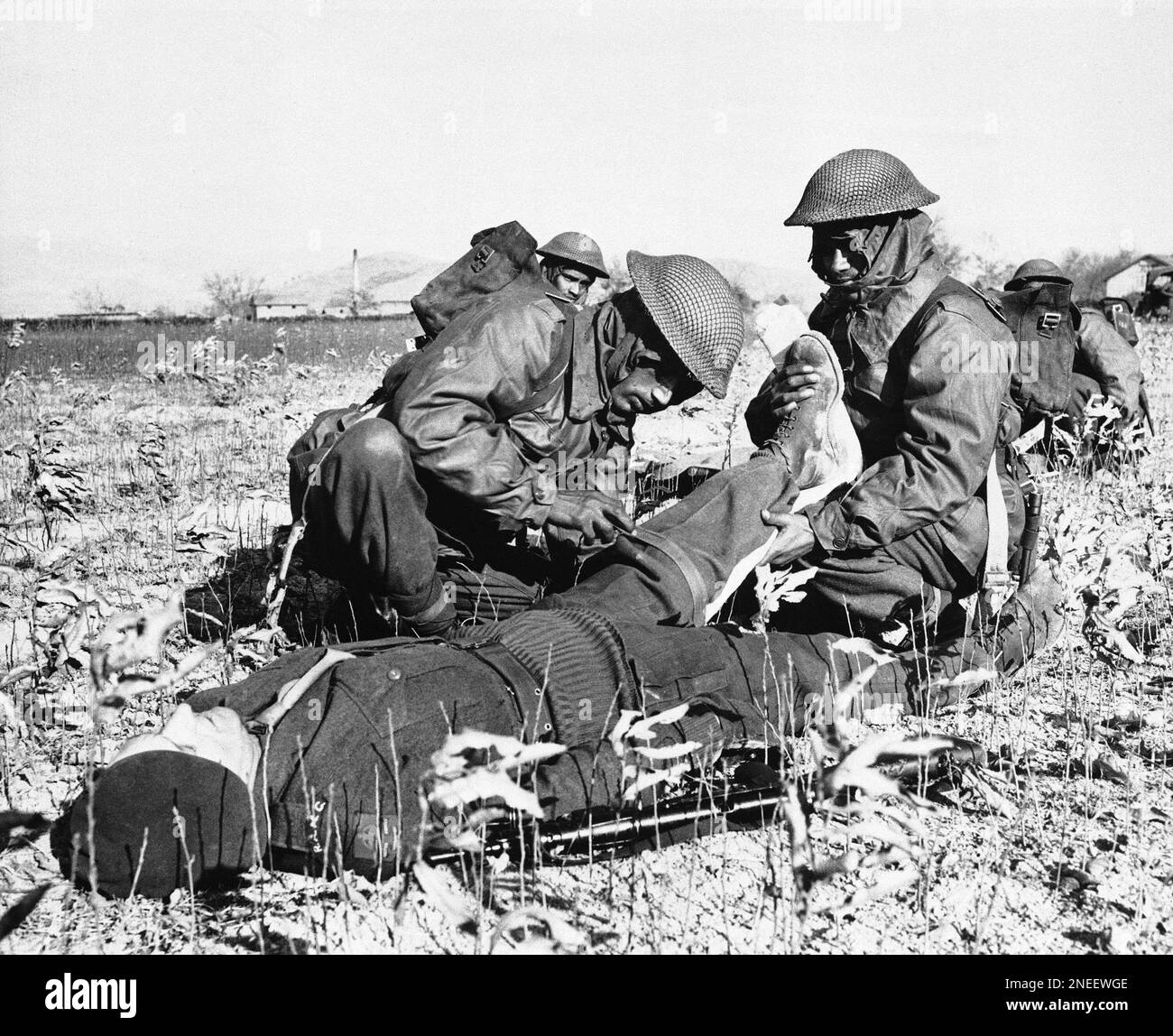 Members of the 60th ambulance unit, from India, set the leg of a ...