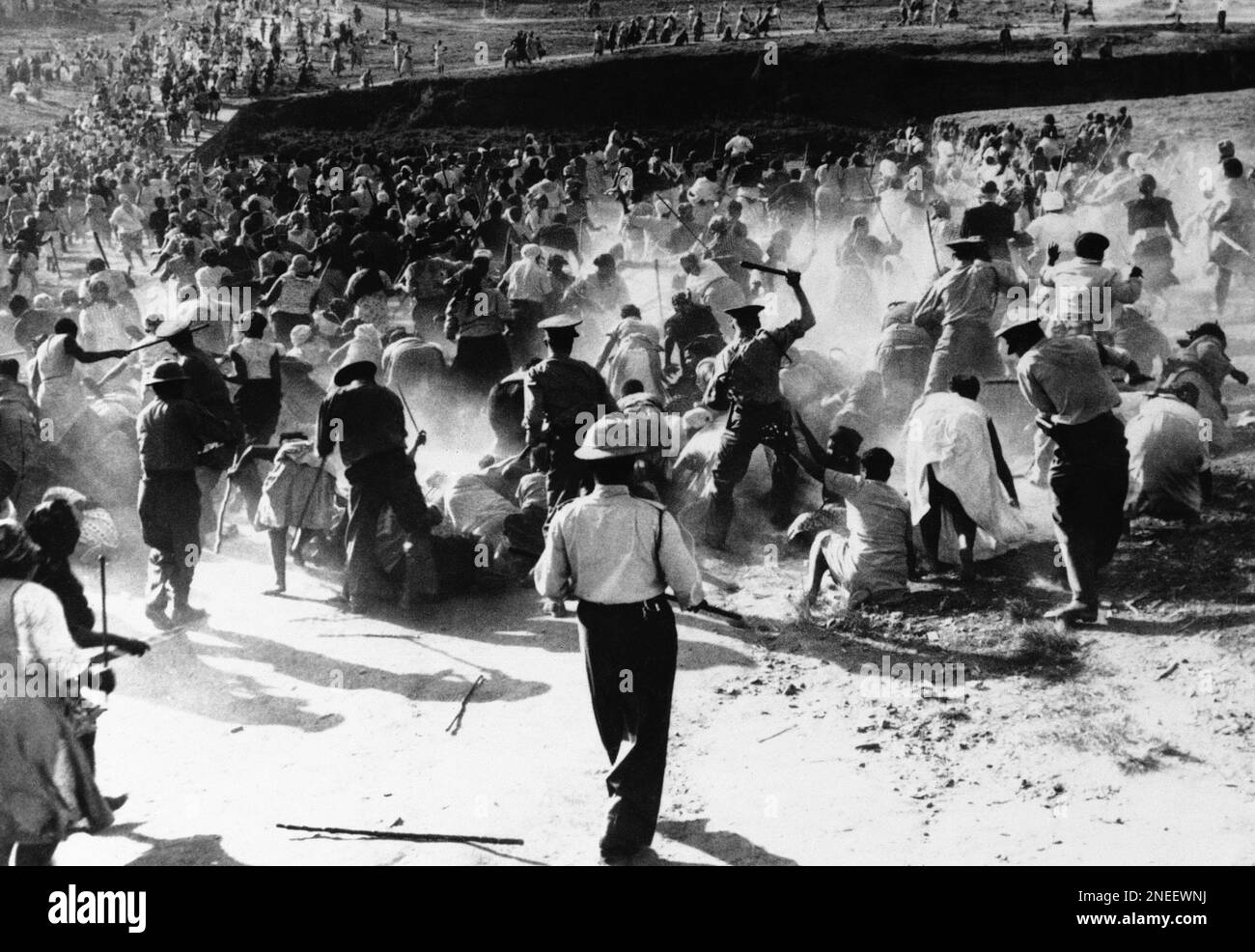 South African police beat women with clubs in Durban in 1959 when the ...