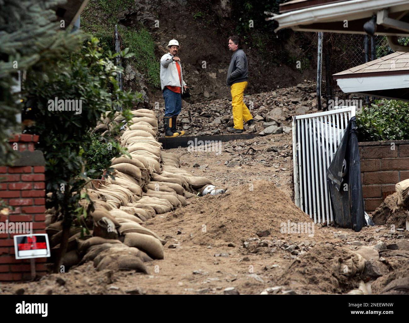 Los Angeles County Flood Control Workers Inspect Mudflow At A Hillside