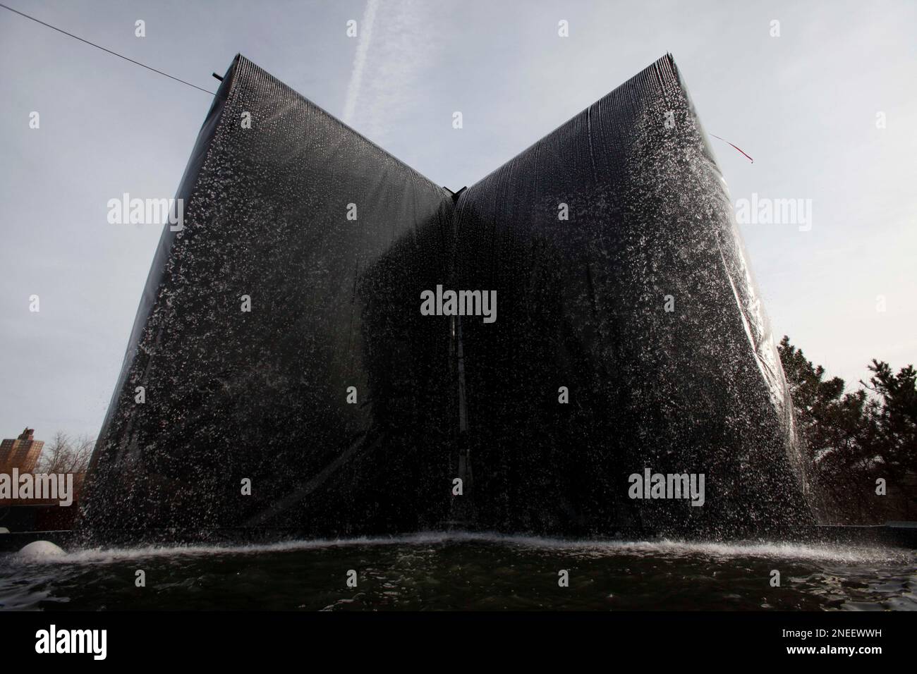 Ribbons of water flow off a mock-up waterfall designed for the National ...