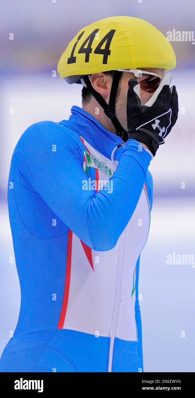 Winner Nicola Rodigari of Italy reacts after crossing the finish line ...