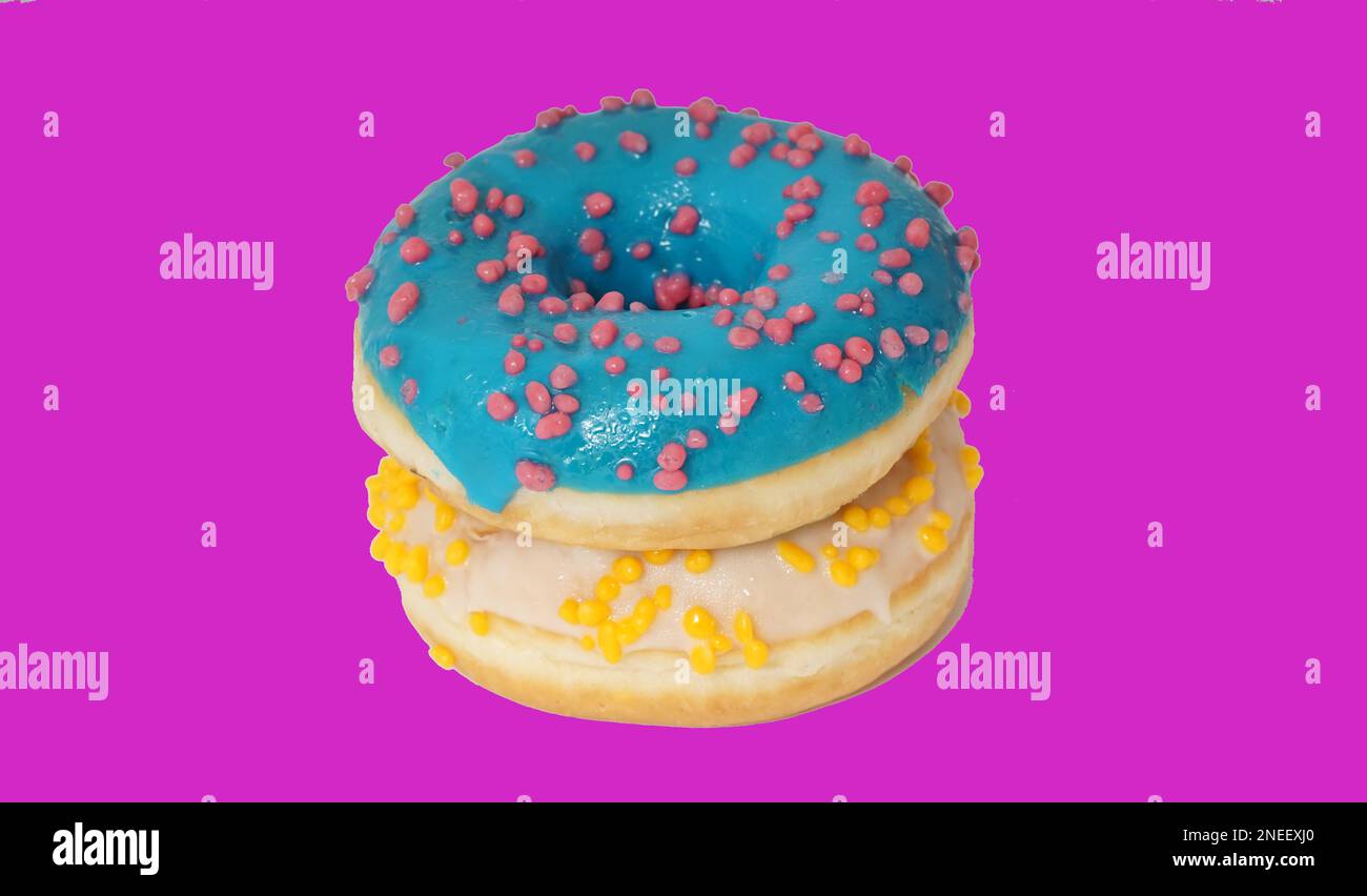 Donut with sprinkles, fast sweet food concept Stock Photo - Alamy