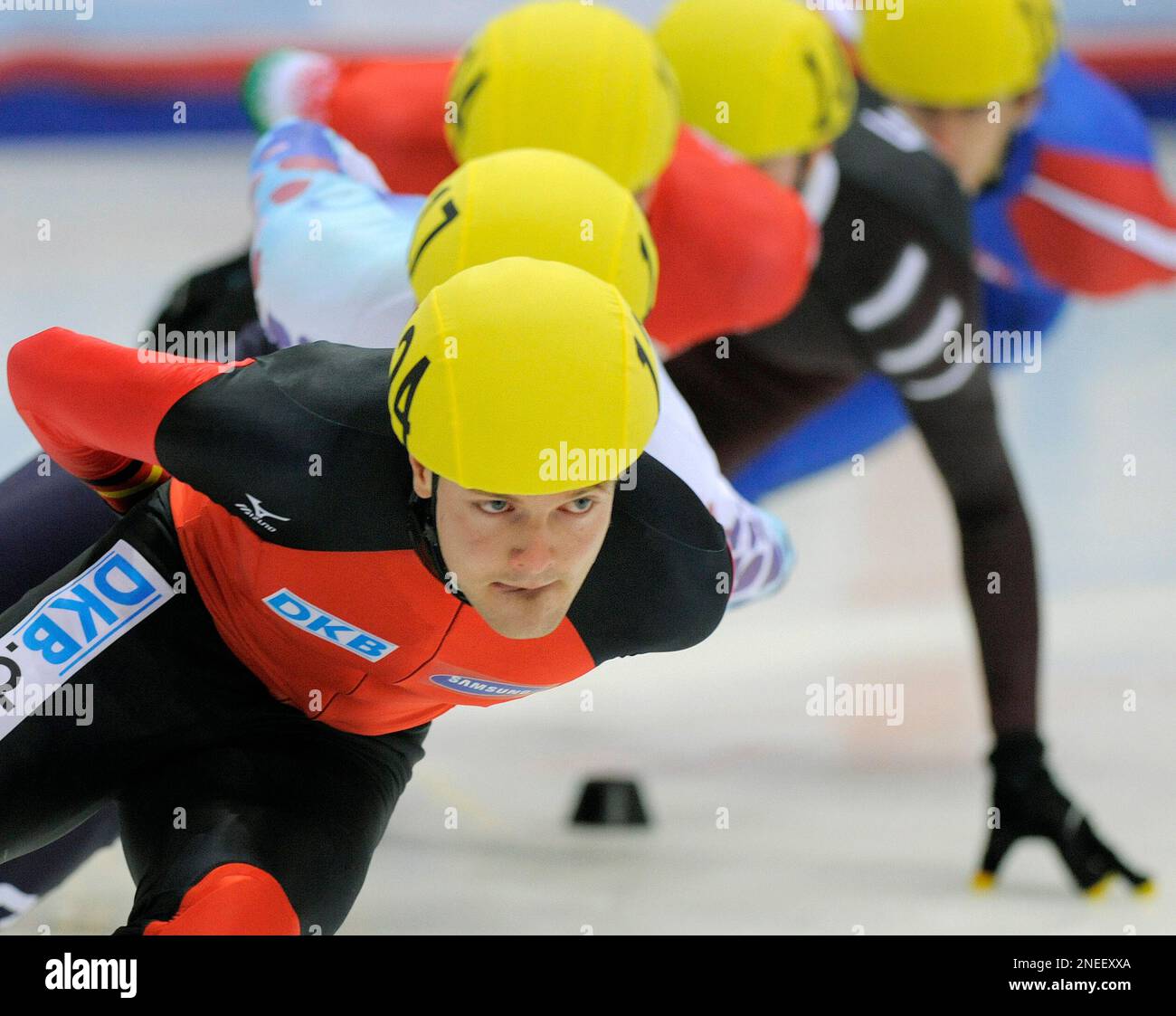 Paul Herrmann of Germany leads a group of short track skaters during ...
