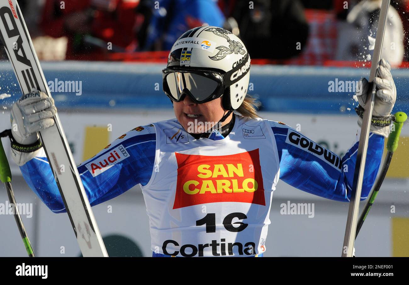 Anja Paerson of Sweden celebrates her third place after completing an ...