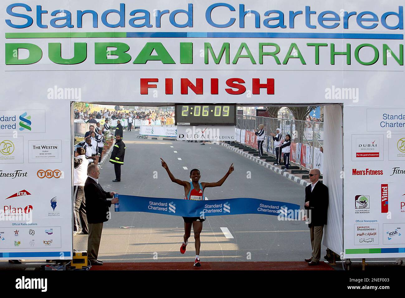 Haile Gebrselassie of Ethiopia crosses the finishing line to win the ...