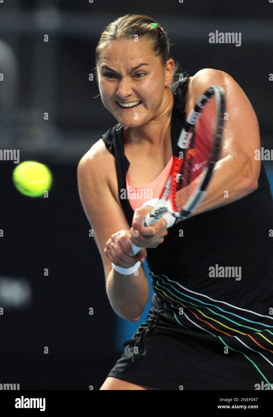 Nadia Petrova of Russia returns to Kim Clijsters of Belgium on her way ...