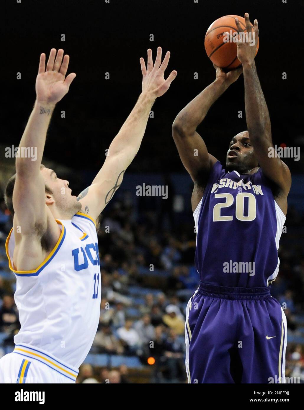 Washington forward Quincy Pondexter (20) shoots over UCLA forward ...