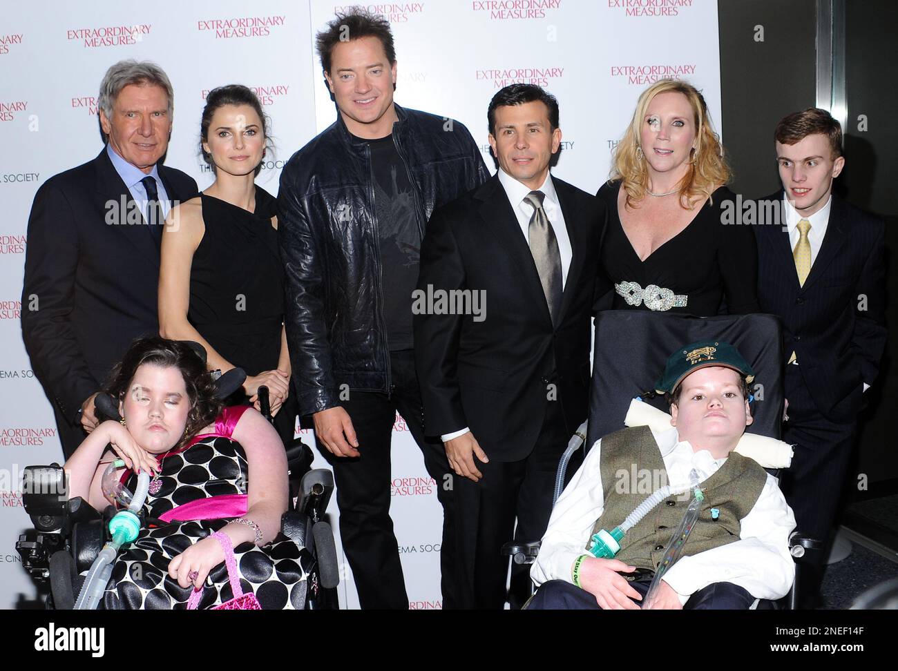 From left, actors Harrison Ford, Keri Russell and Brendan Fraser pose ...