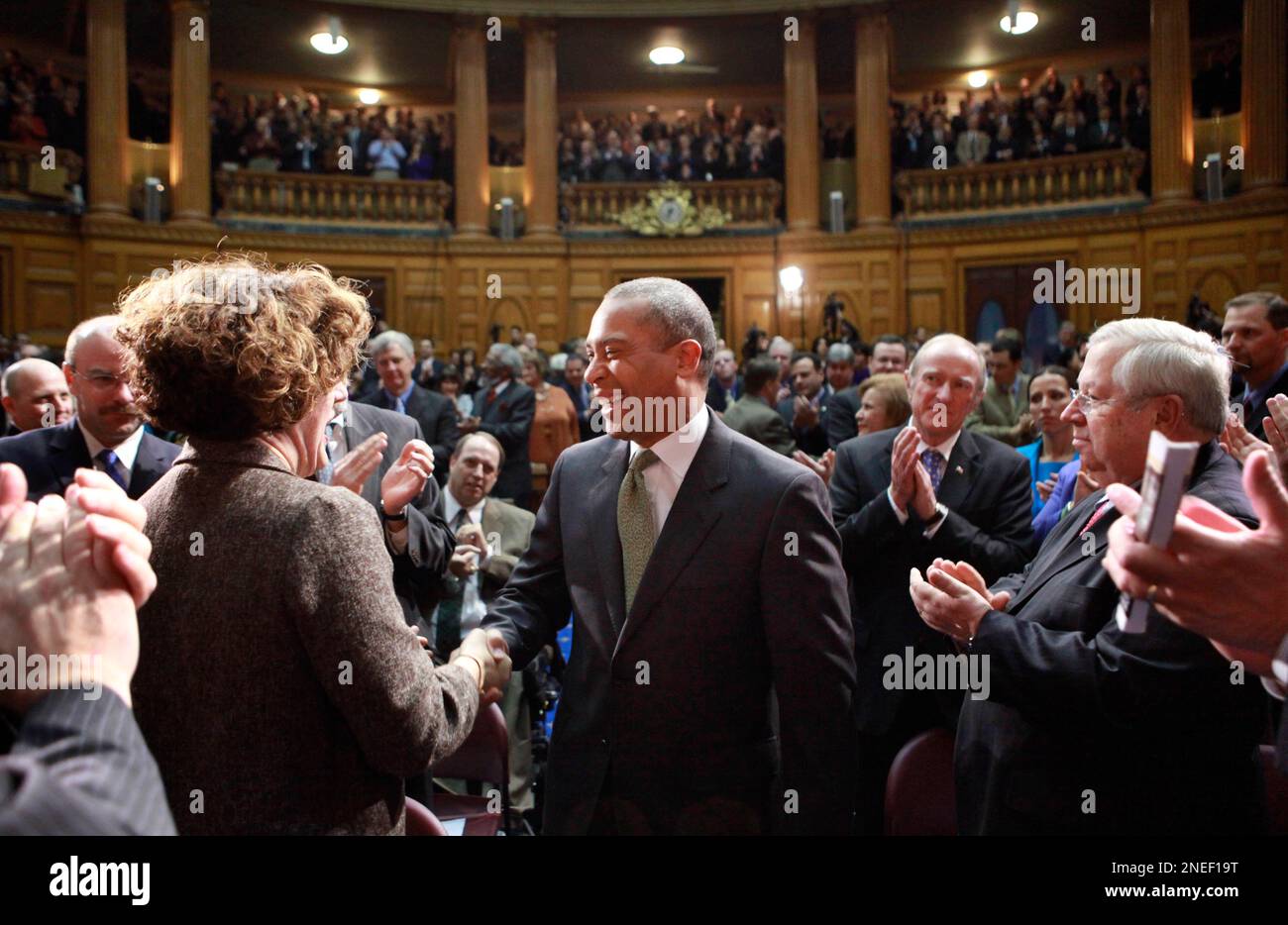 Massachusetts Gov. Deval Patrick greets people as he enters the House ...