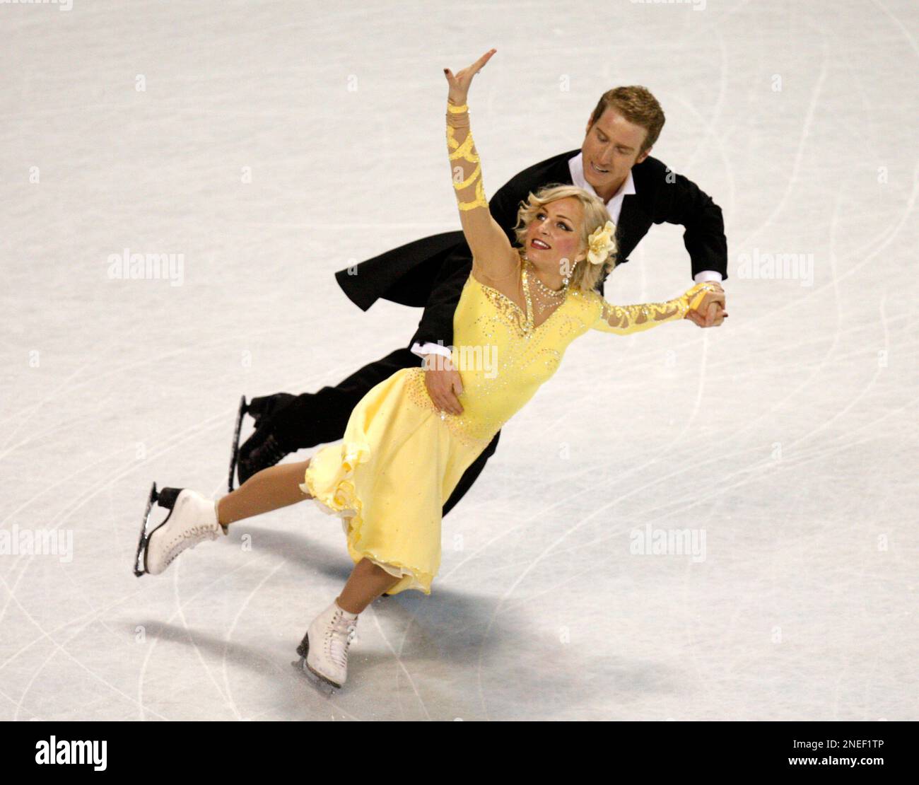 Trina Pratt and Chris Obzansky skate during their compulsory ice ...