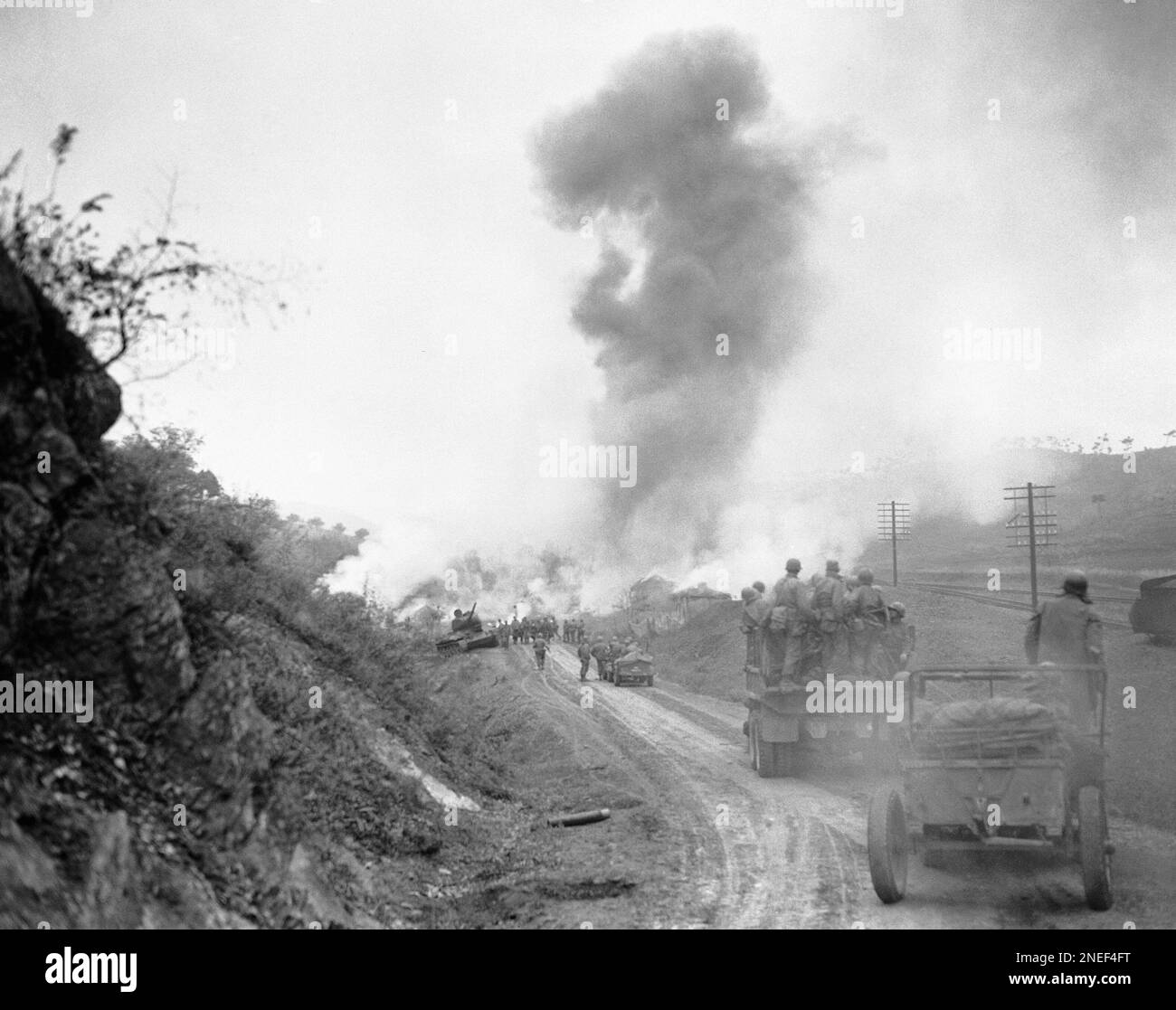 An American troop column on outskirts of Pyongyang is halted as an ...