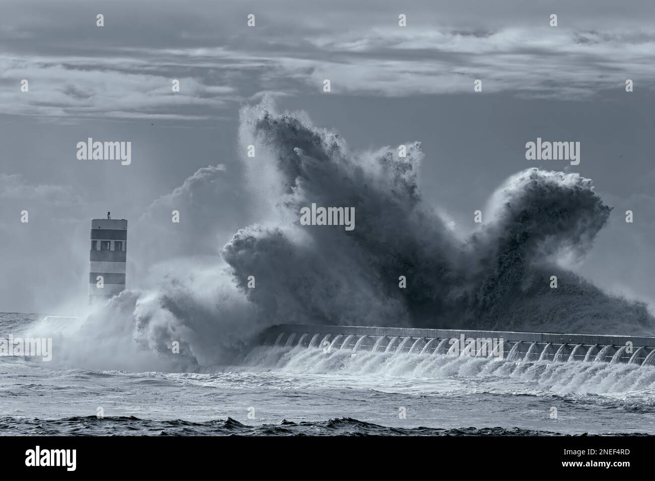 Big wave splash. Converted black and white. Toned blue Stock Photo - Alamy