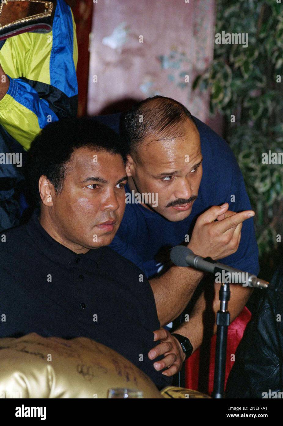 Heavyweight boxer David Bey, right, points with former world champion Muhammad Ali at a press ...