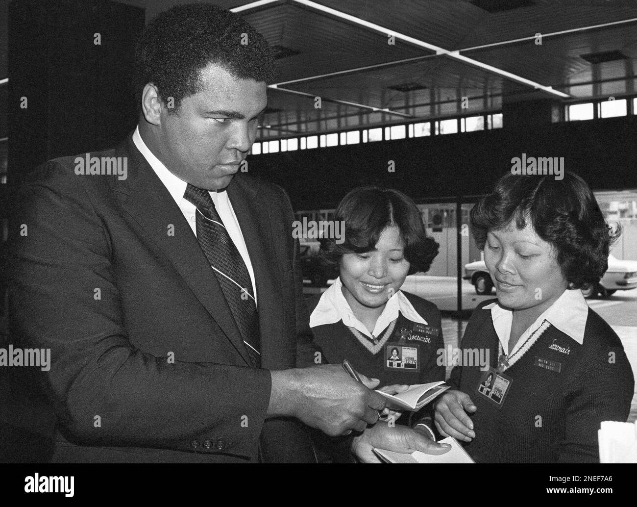 Former world heavyweight boxing champion Muhammad Ali playfully glares ...