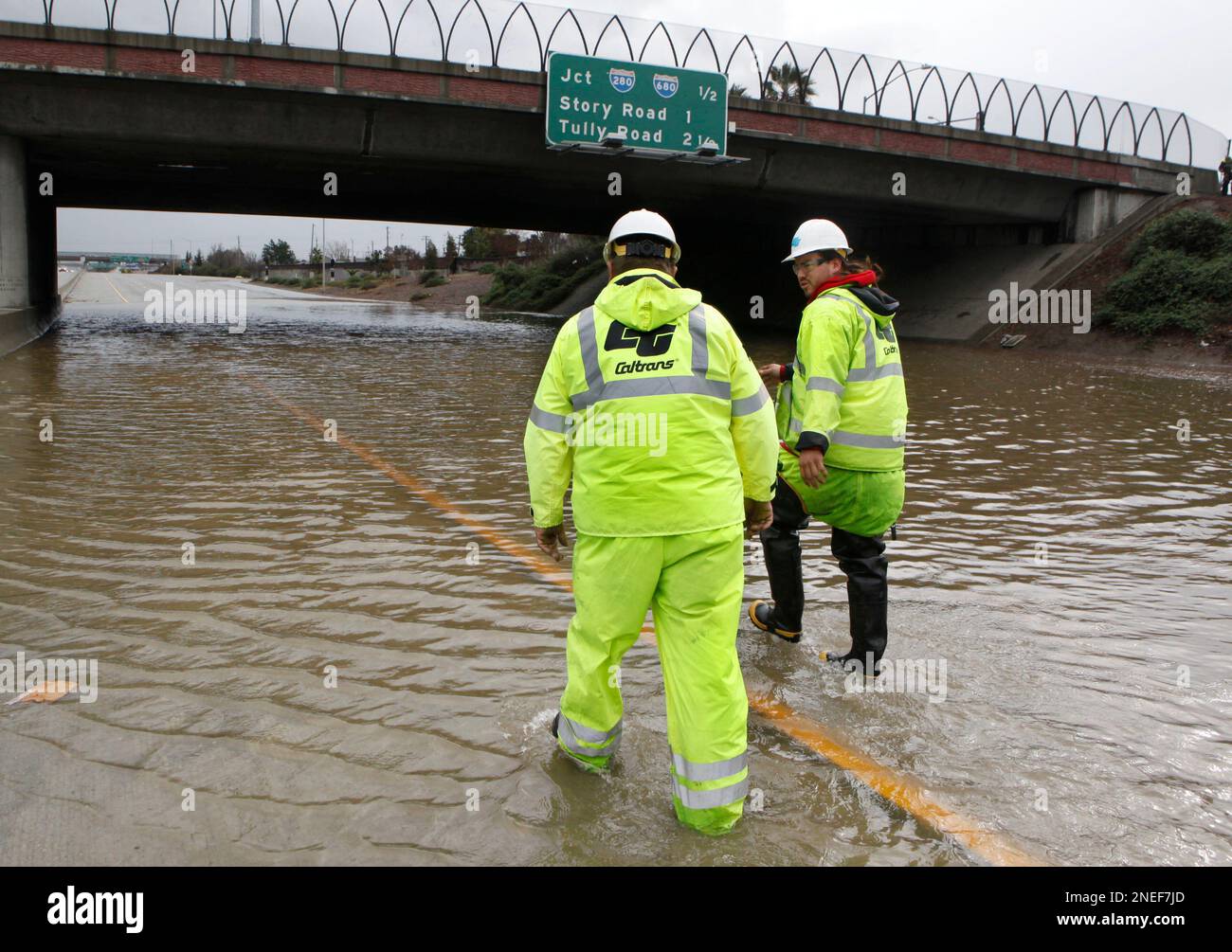 Flooding closed all lanes of southbound highway 101 as highway workers ...