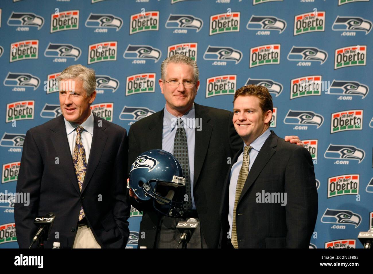 Seattle Seahawks head coach Pete Carroll, left, team CEO Tod Leiweke ...