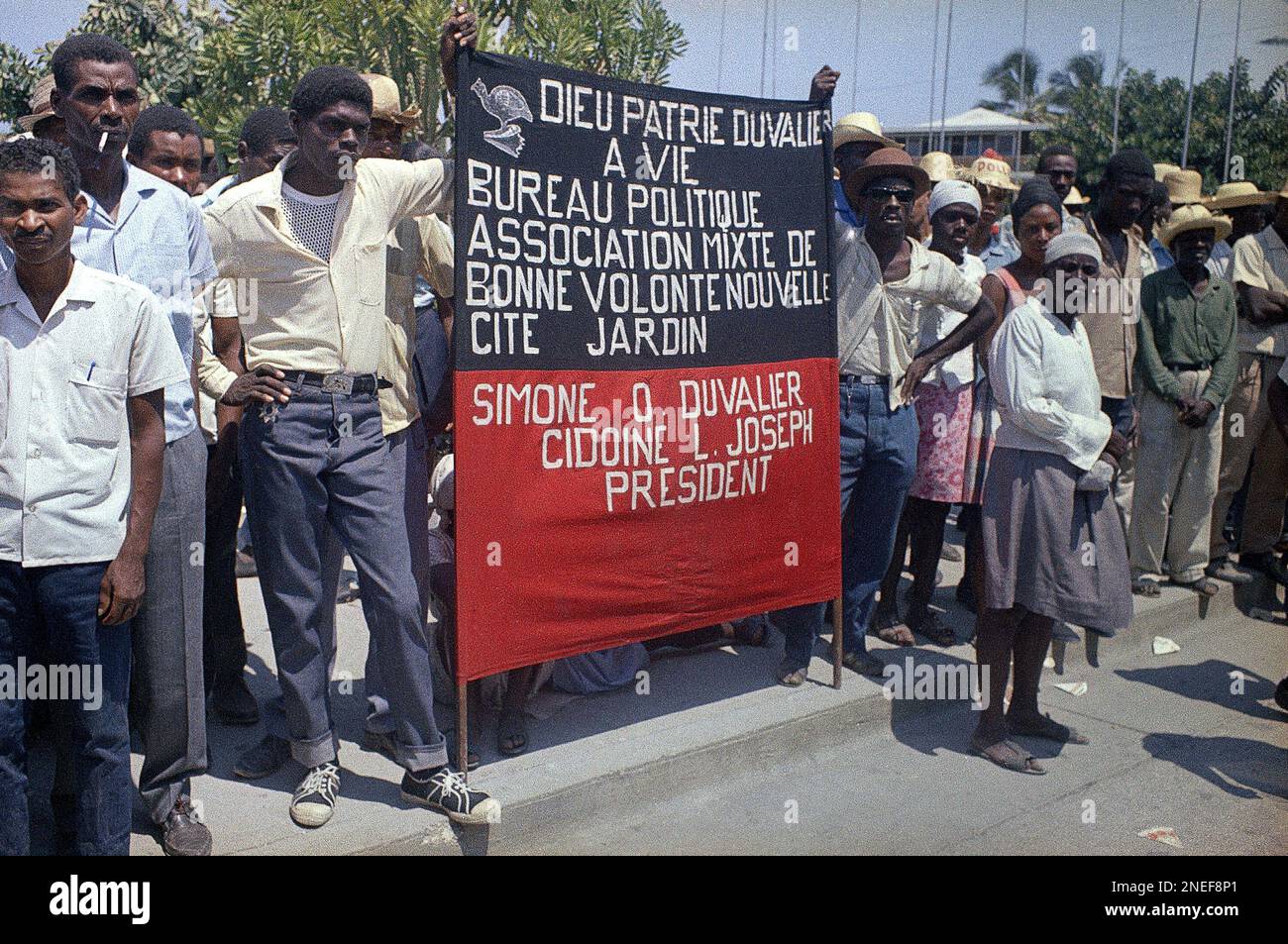 Tonton Maconte marching in downtown Port au Prince in support of PA PA ...